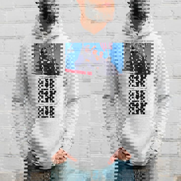 Trump Head Cartoon Bloody Ear 2024 Vote Survivor Fight Fight Hoodie ...